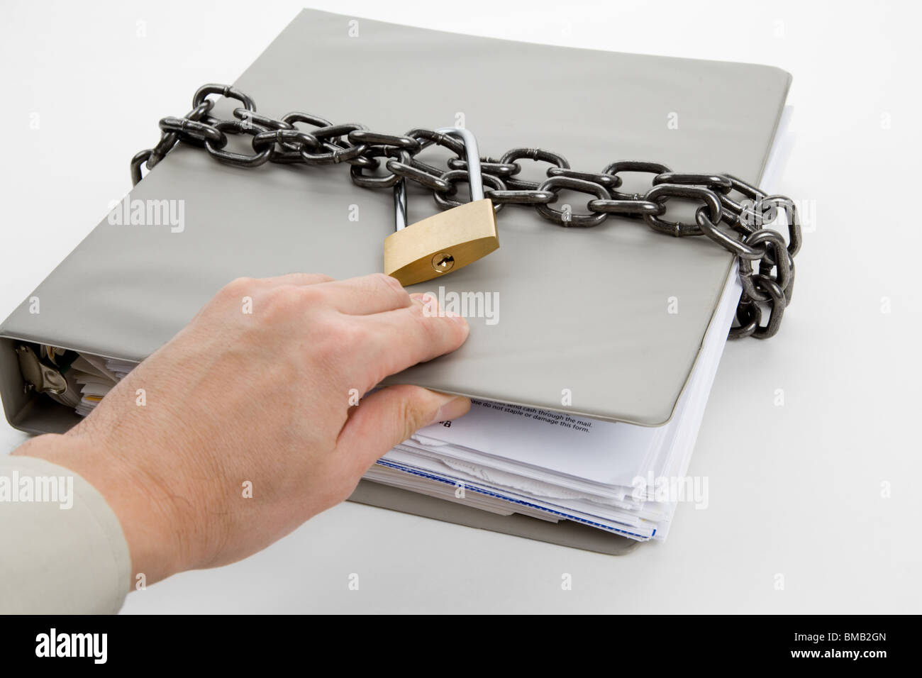 Lock and file folder, concept of Confidential Document Stock Photo - Alamy
