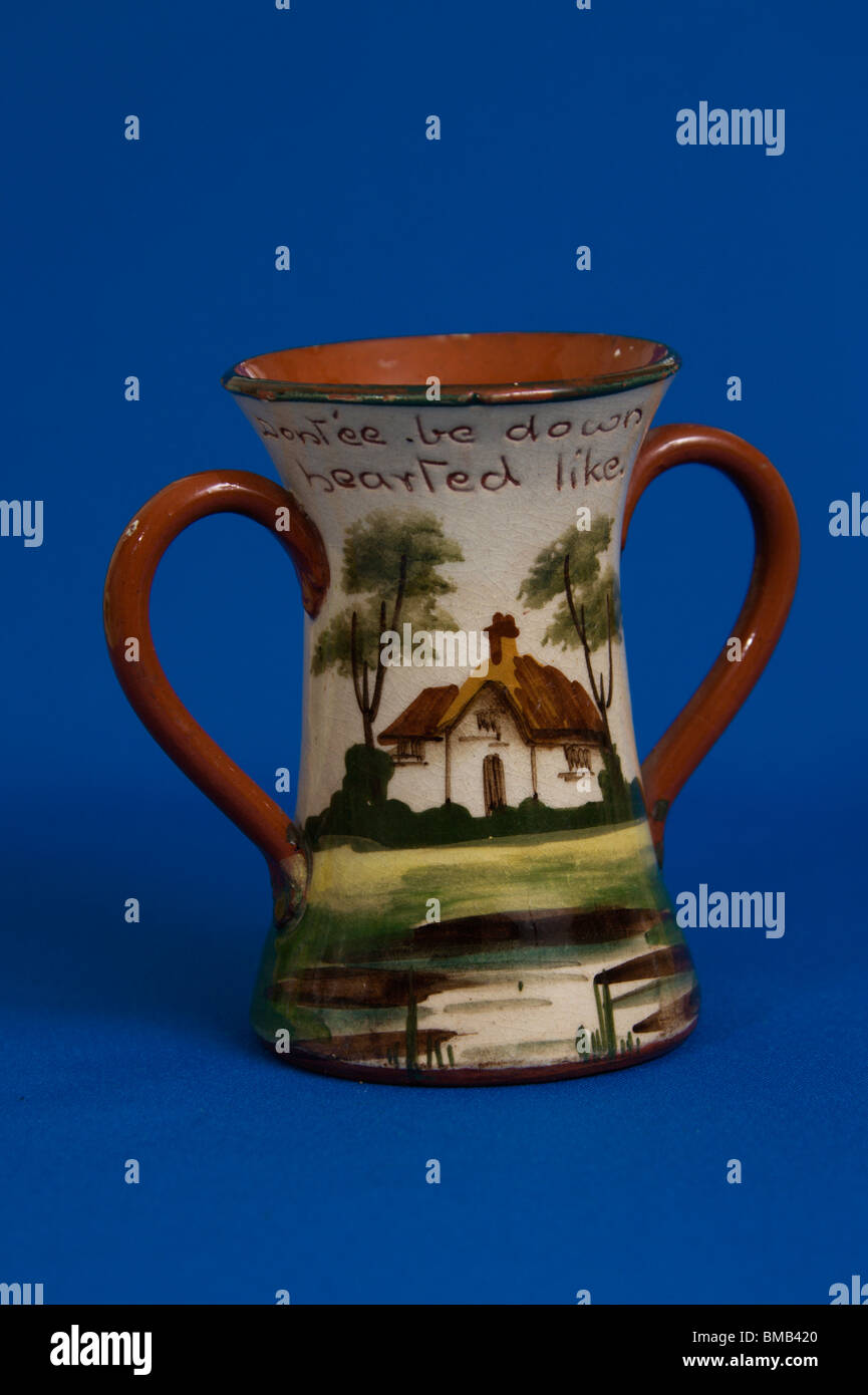 mottoware Devon ware vase with handles Stock Photo - Alamy