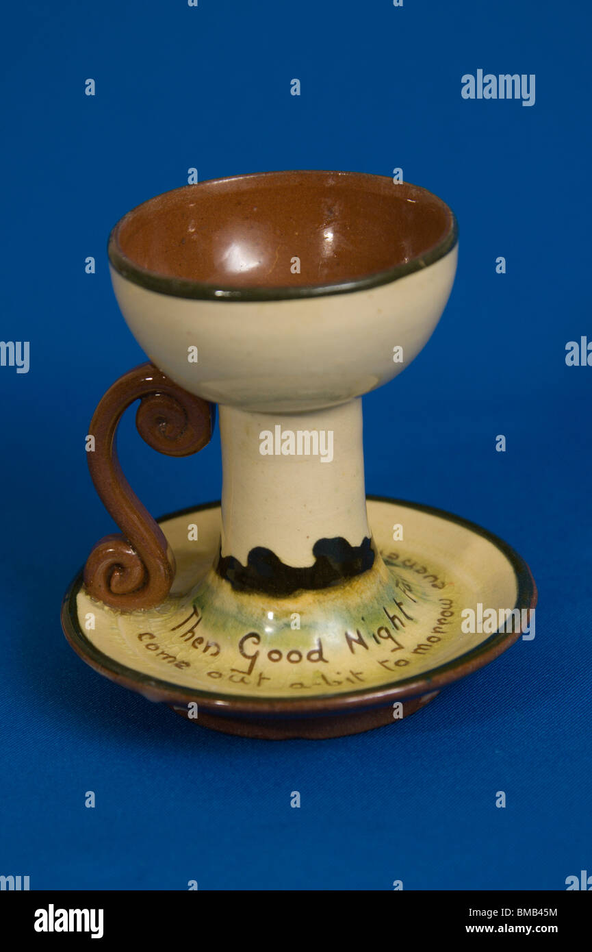 mottoware Devon ware candlestick holder Stock Photo - Alamy