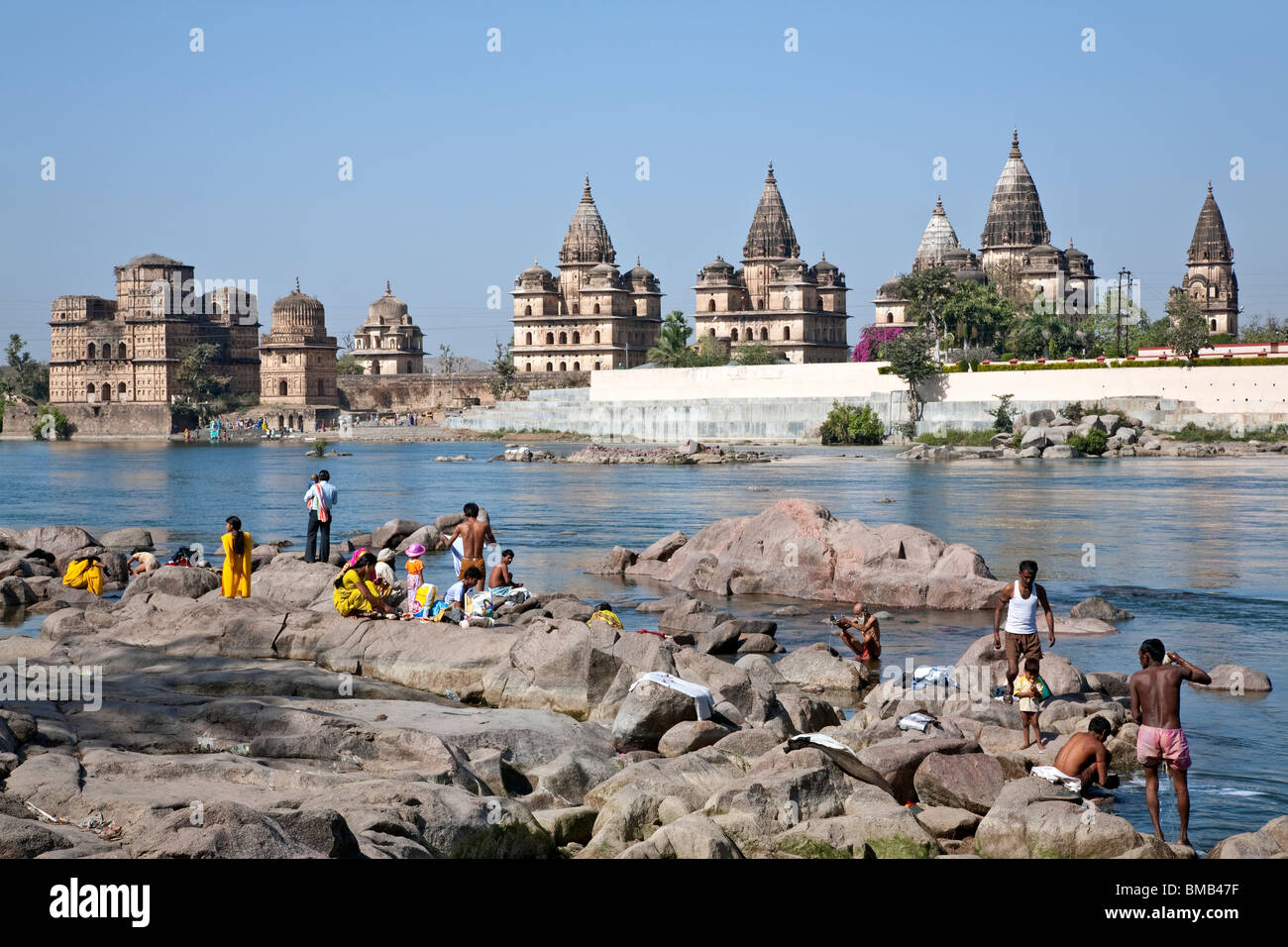 People bathing in the Petwa river. On the background the Royal ...