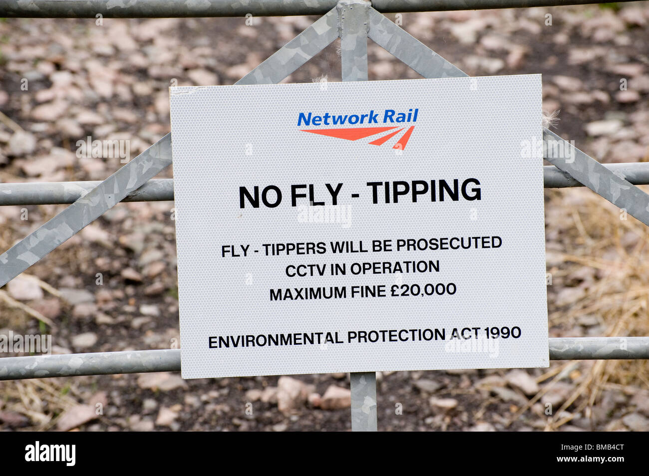Network Rail no fly tipping sign on a gate in England Stock Photo - Alamy