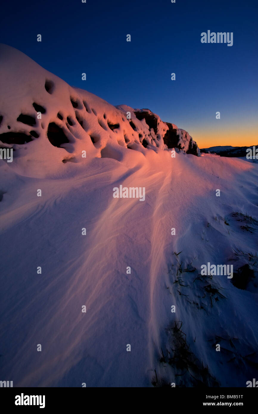 Snow at sunset Stock Photo - Alamy