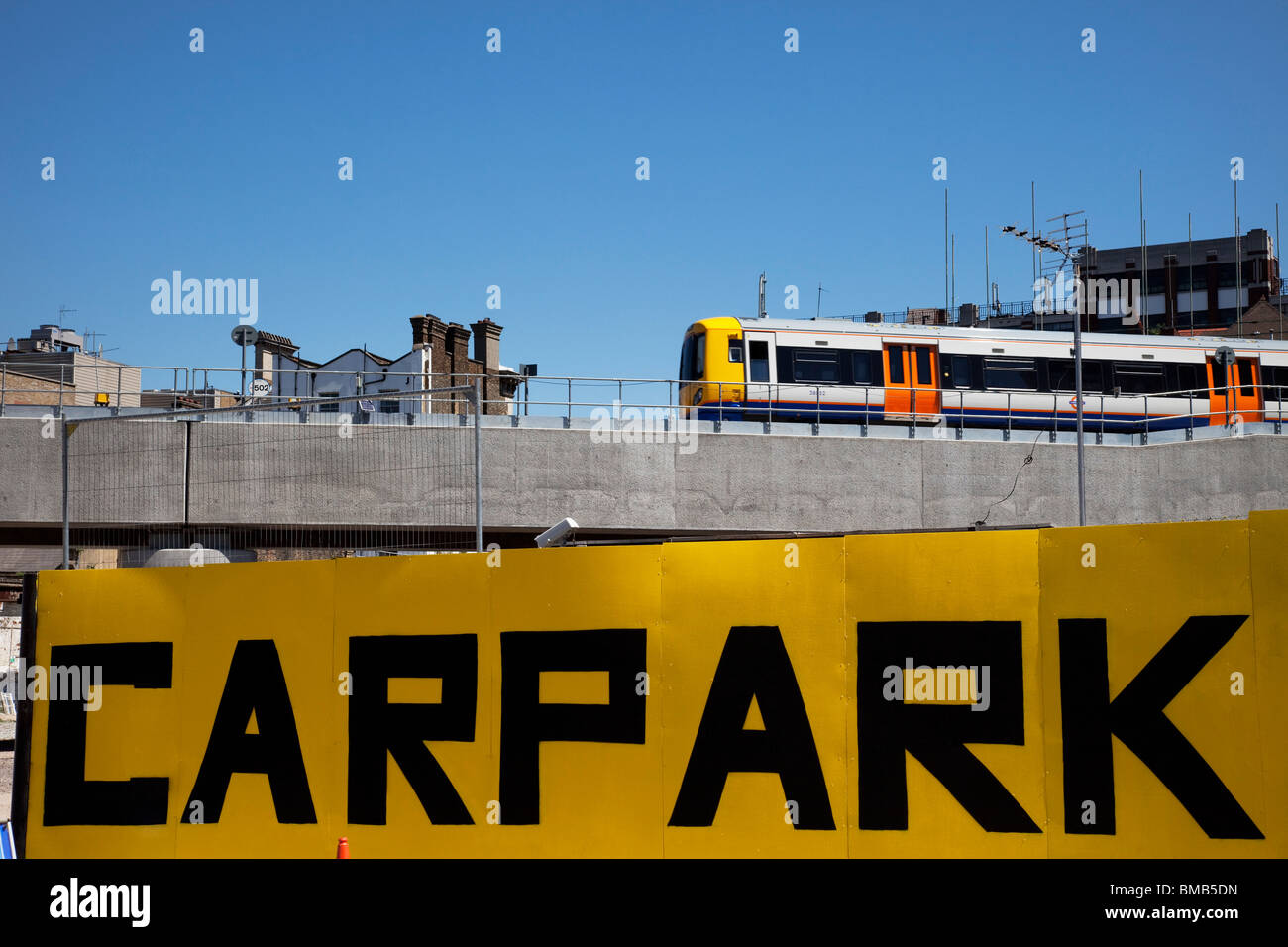 Huge car Park sign and the new East London Overground Line which passes ...