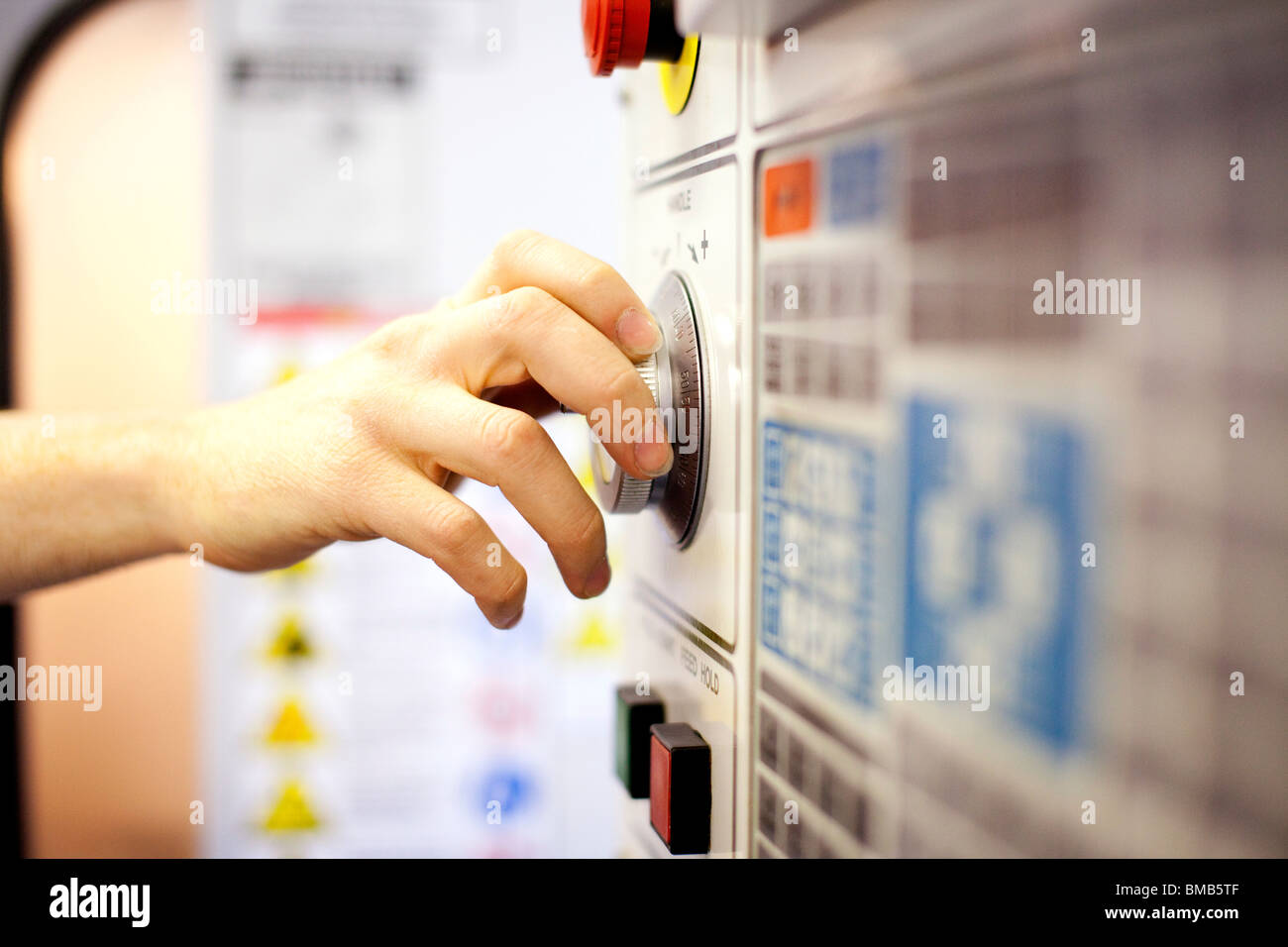 Male hand controls cnc machine hi-res stock photography and images - Alamy