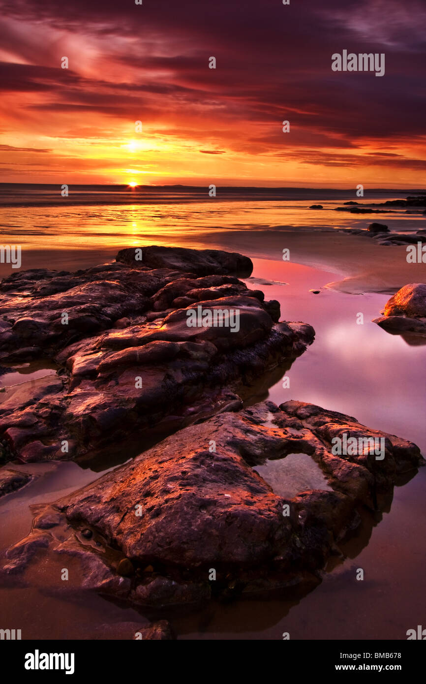 Sunset at Rest Bay Stock Photo - Alamy