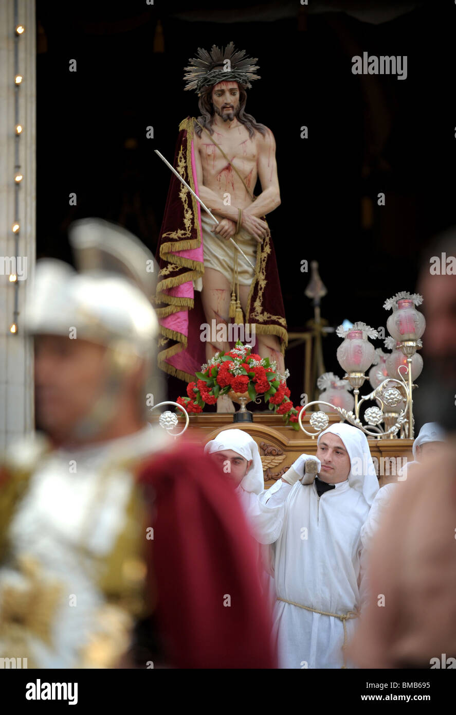 Statue of Jesus is carried outside Senglea Church during Good Friday ...