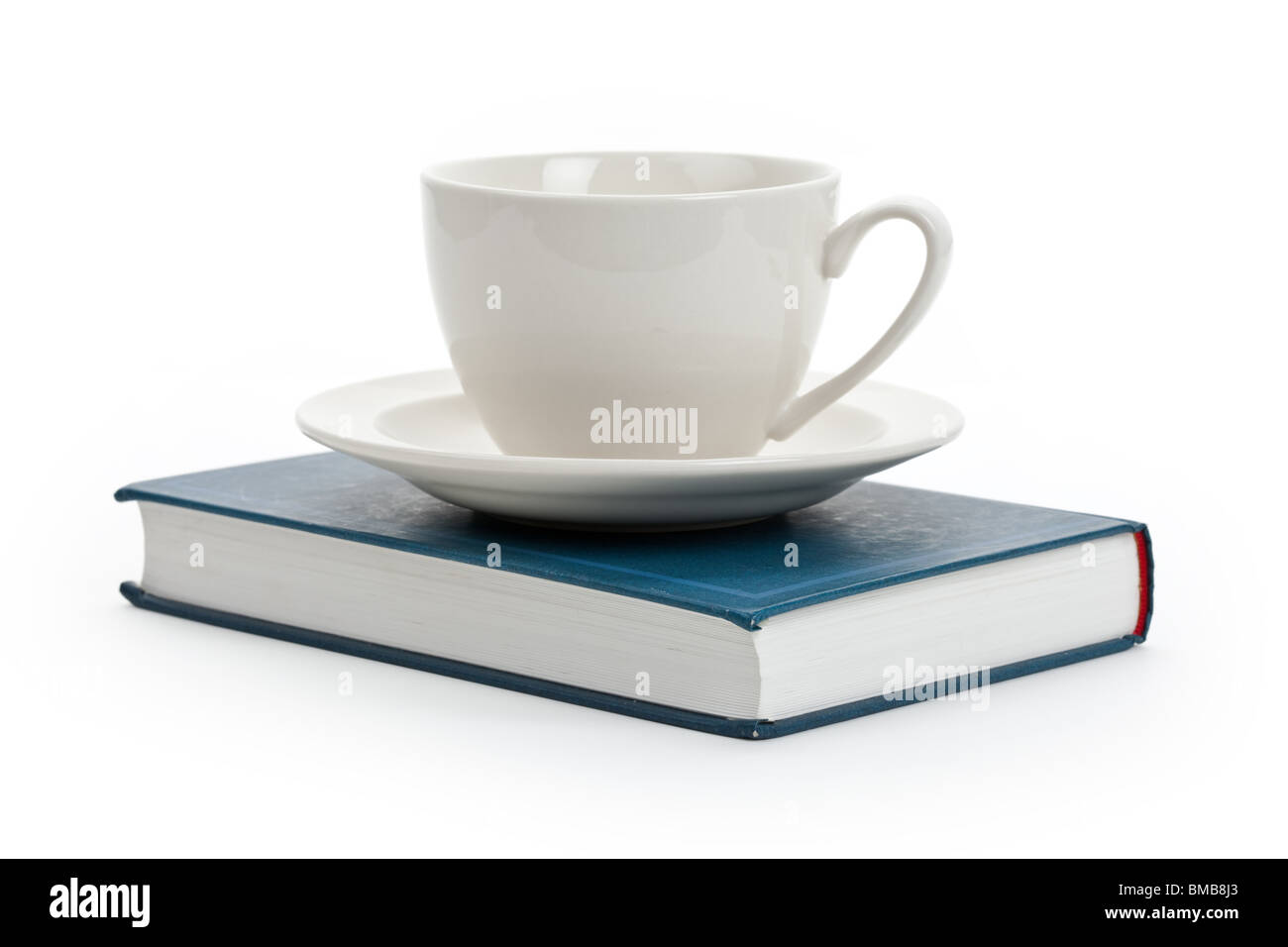White Coffee Cup and book close up Stock Photo - Alamy
