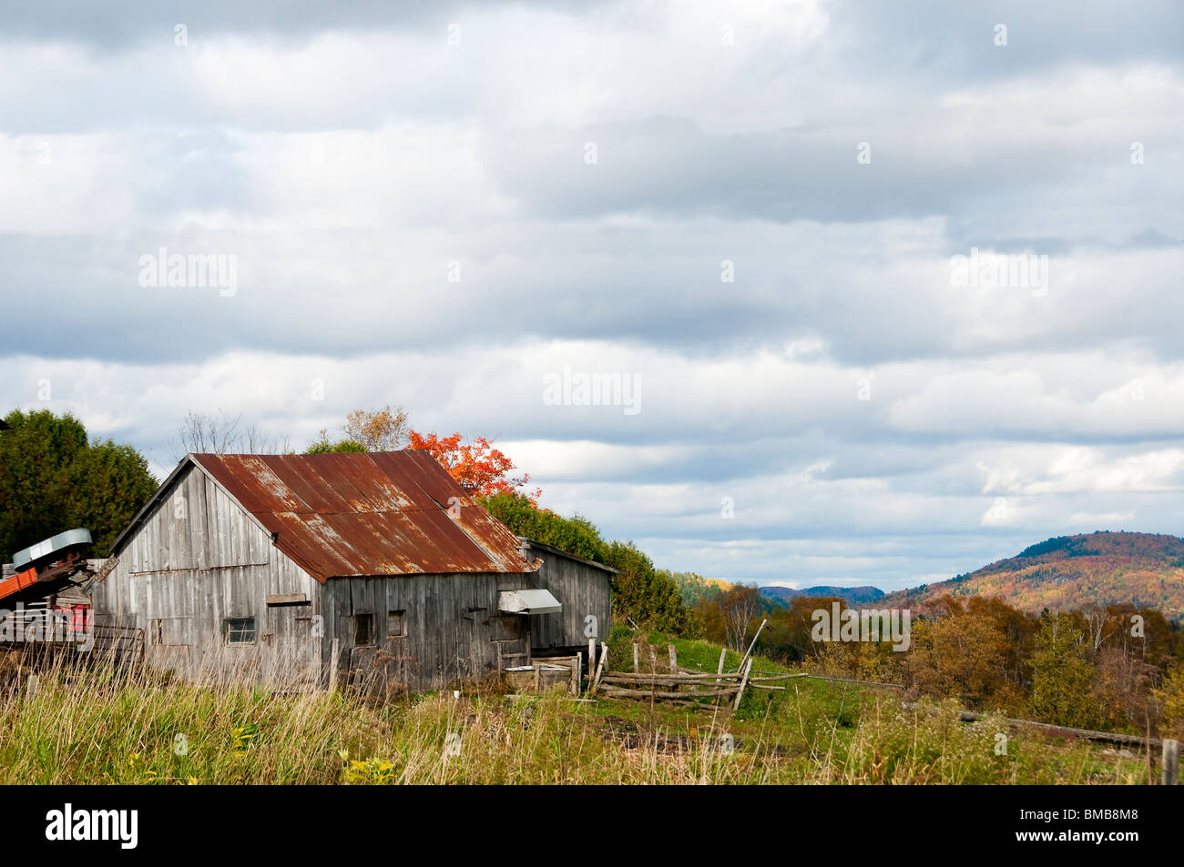 old rustic barn of Quebec Country of High Laurentides in autumn, Canada ...