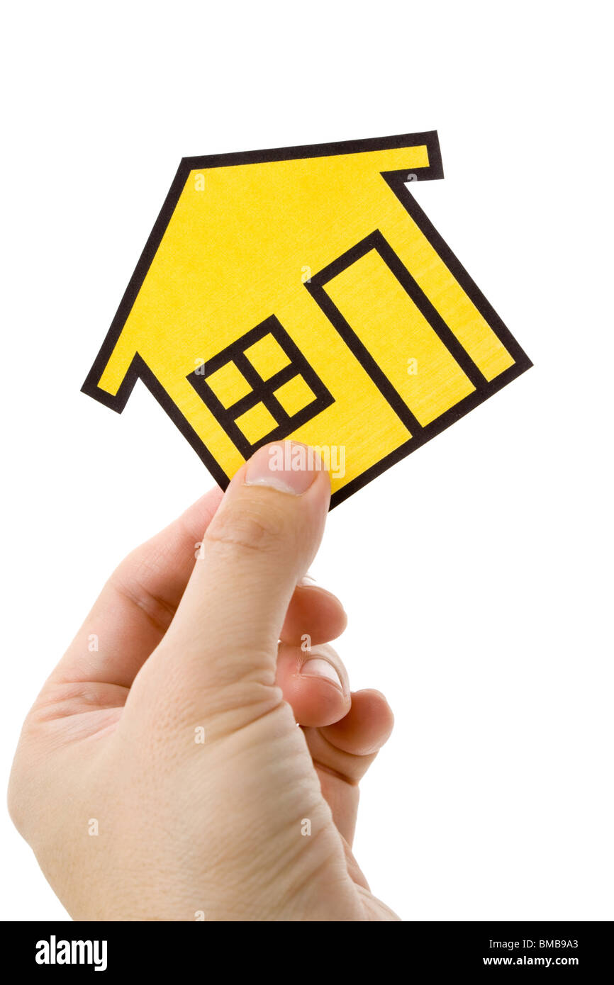 Hand holding a home sign, Real Estate Concept Stock Photo - Alamy