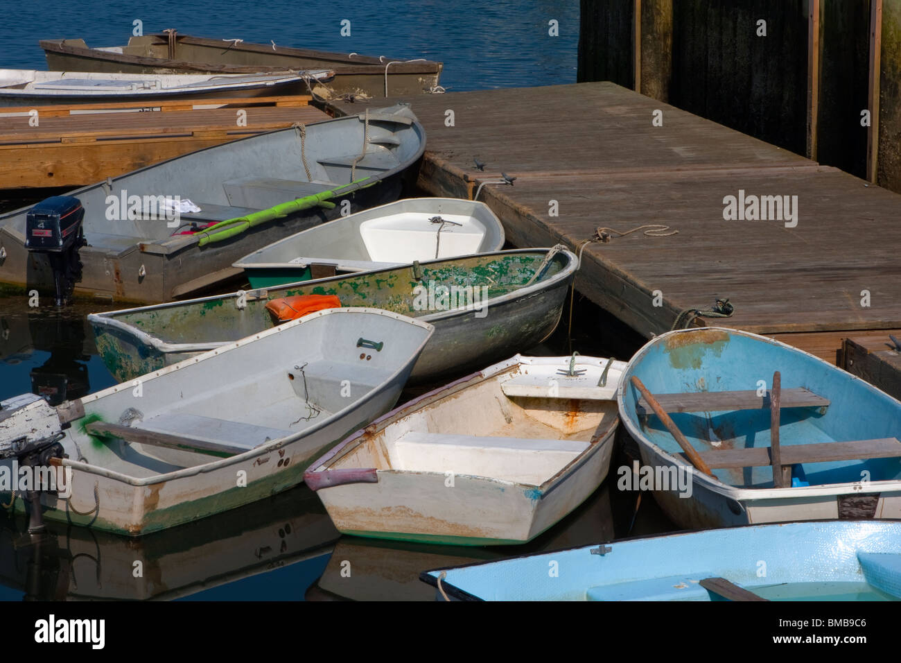 Ten Boats Tied Up on Dock at Wharf Stock Photo - Alamy
