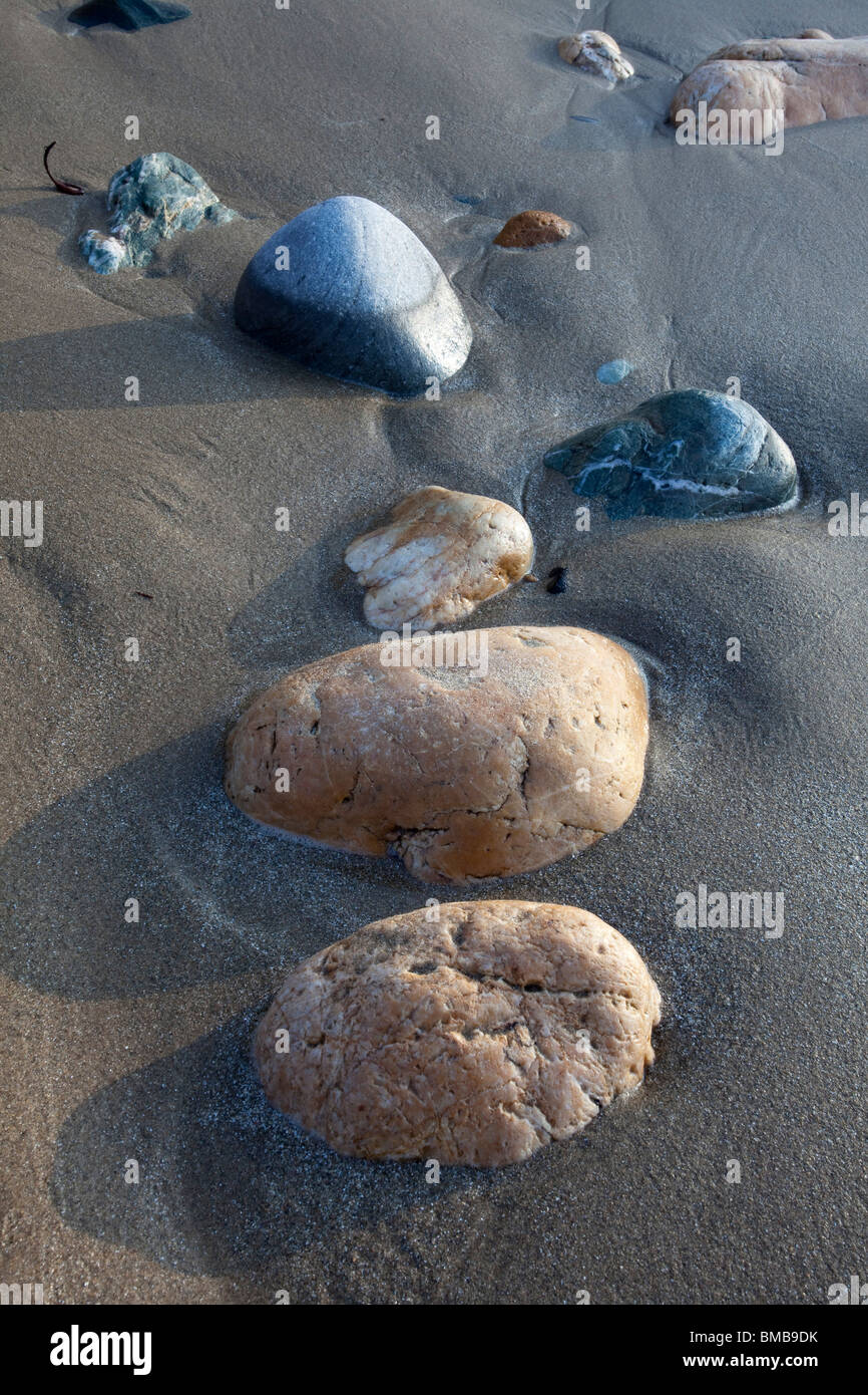 multi colored pebbles on beach Stock Photo - Alamy