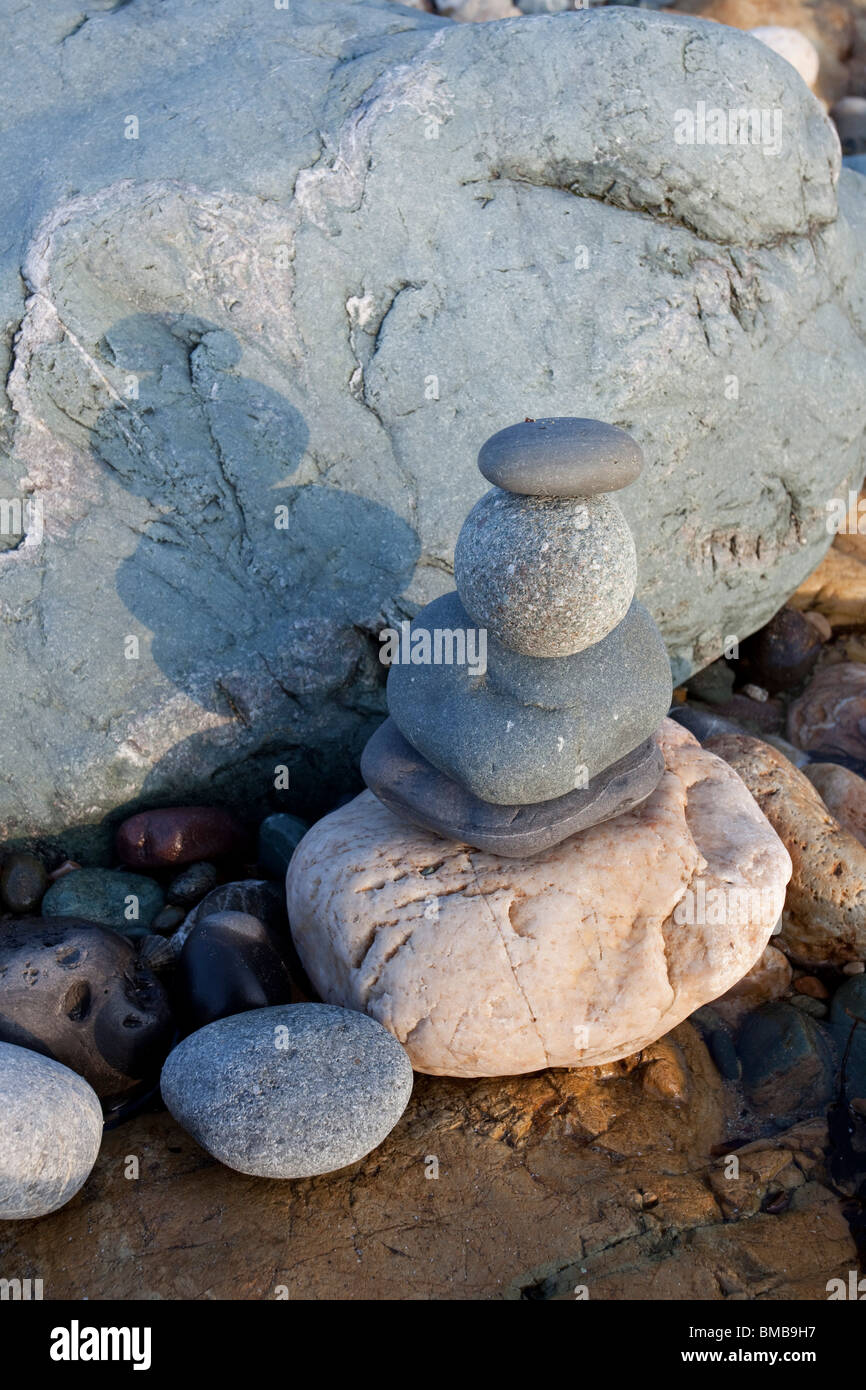 pebbles stacked up on beach Stock Photo - Alamy