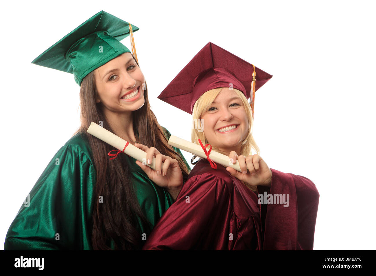 two female college graduates in cap and gown Stock Photo - Alamy