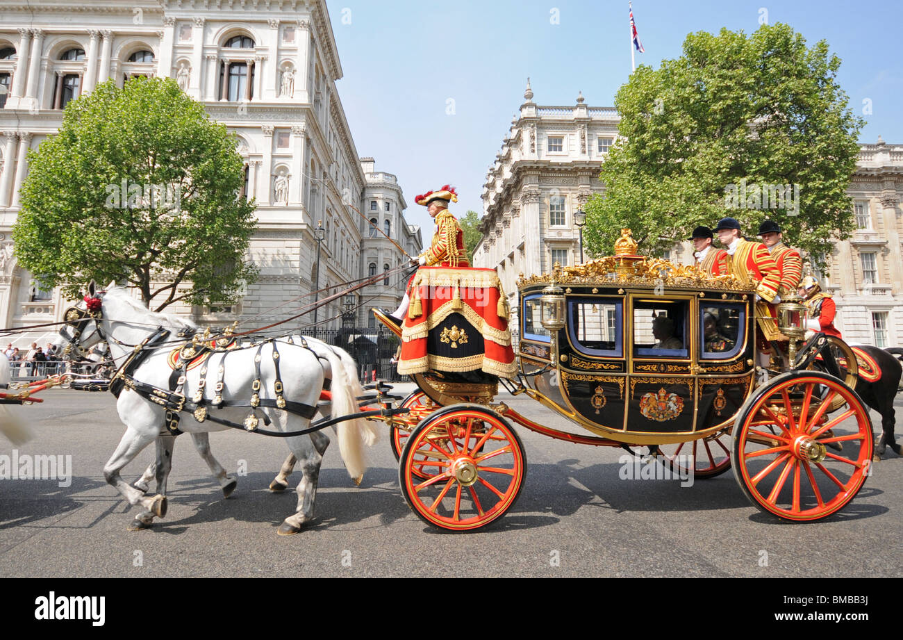 Queen Elizabeth II passes Downing Street in her ceremonial carriage on ...