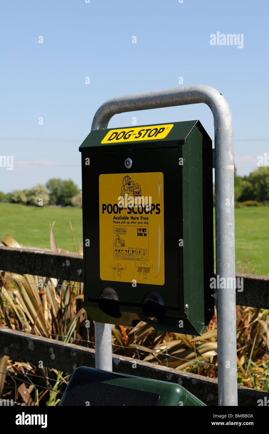 Dog stop a poop scoop dispenser alongside a country walk in Trim County ...