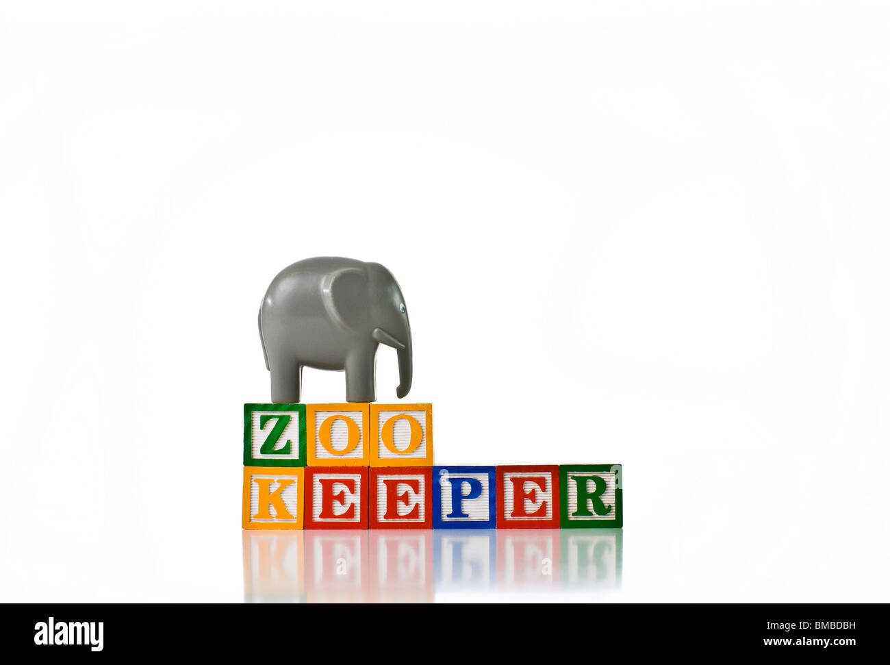 Colorful children's blocks spelling ZOO KEEPER with an elephant Stock ...