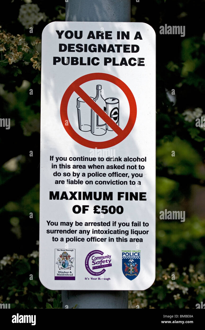 Designated place sign warning of a fine for the drinking of alcohol in ...
