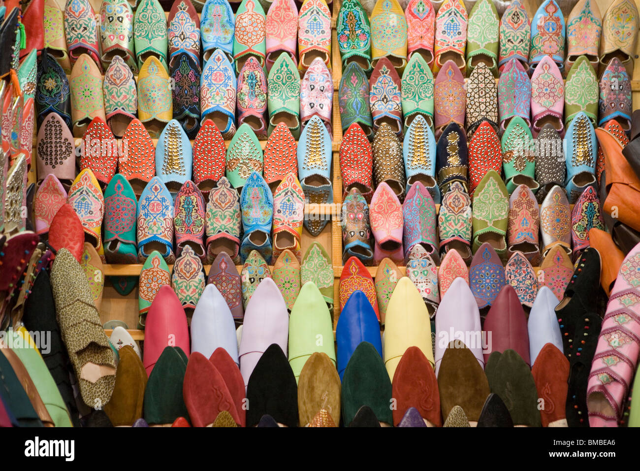 Racks of multi coloured slippers in souk , Marrakesh , Morocco ...