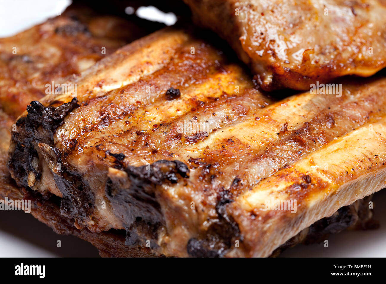Grilled pork ribs, spicy and delicious Stock Photo - Alamy