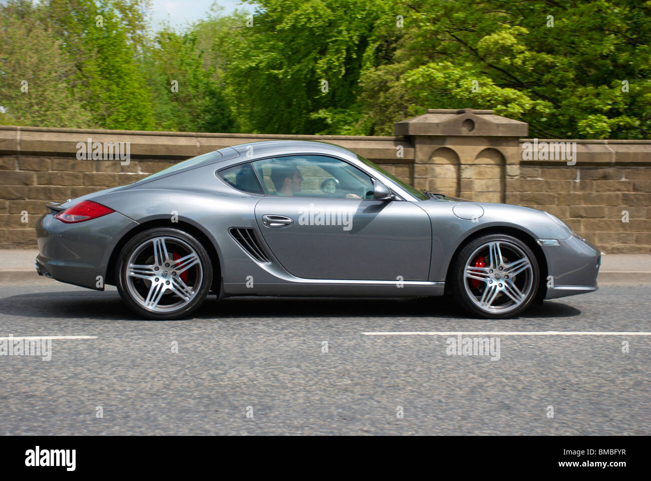 Porsche sports car going over a bridge Stock Photo - Alamy