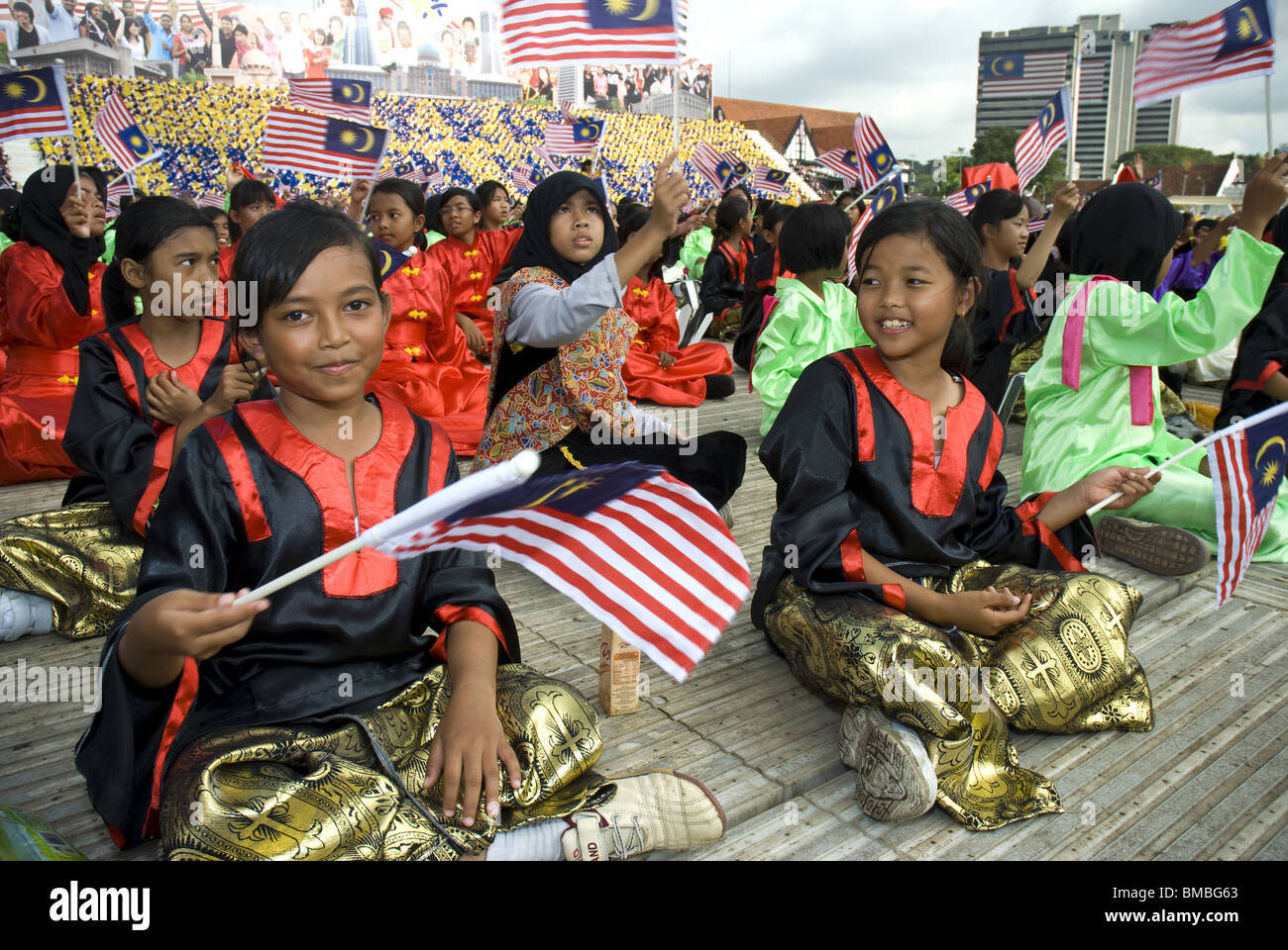 Young performers waving the Malaysian flag, Merdeka Square, Kuala ...