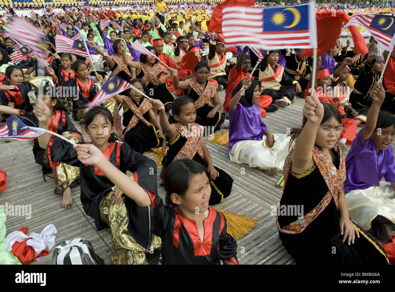 Young performers waving the Malaysian flag, Merdeka Square, Kuala ...