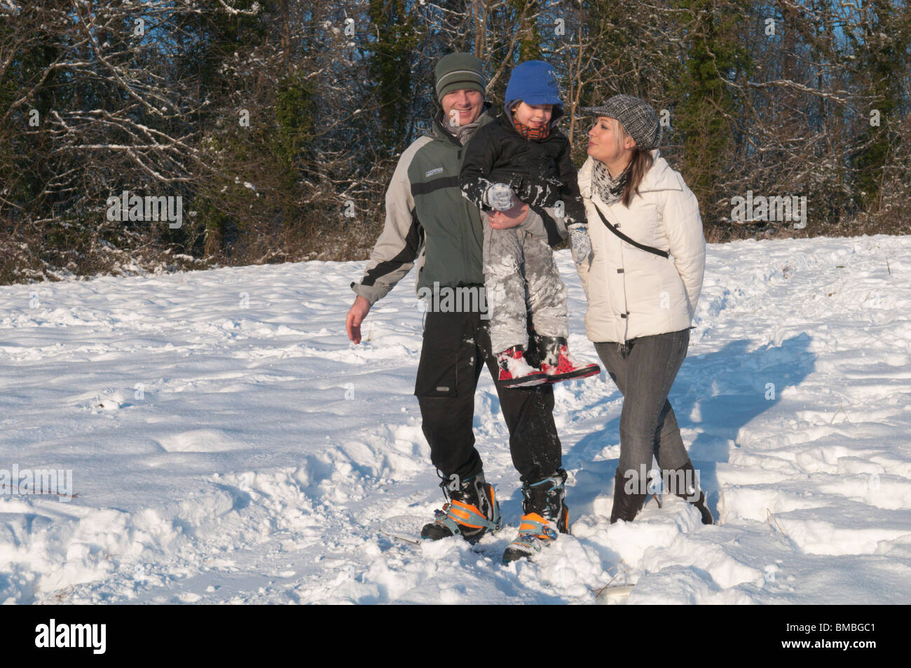 Mother son child snow hug hi-res stock photography and images - Alamy