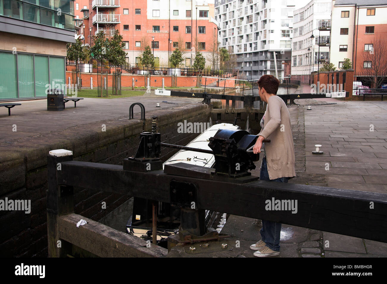 Woman working a canal lock, barge, going through Lock 89, Rochdale ...
