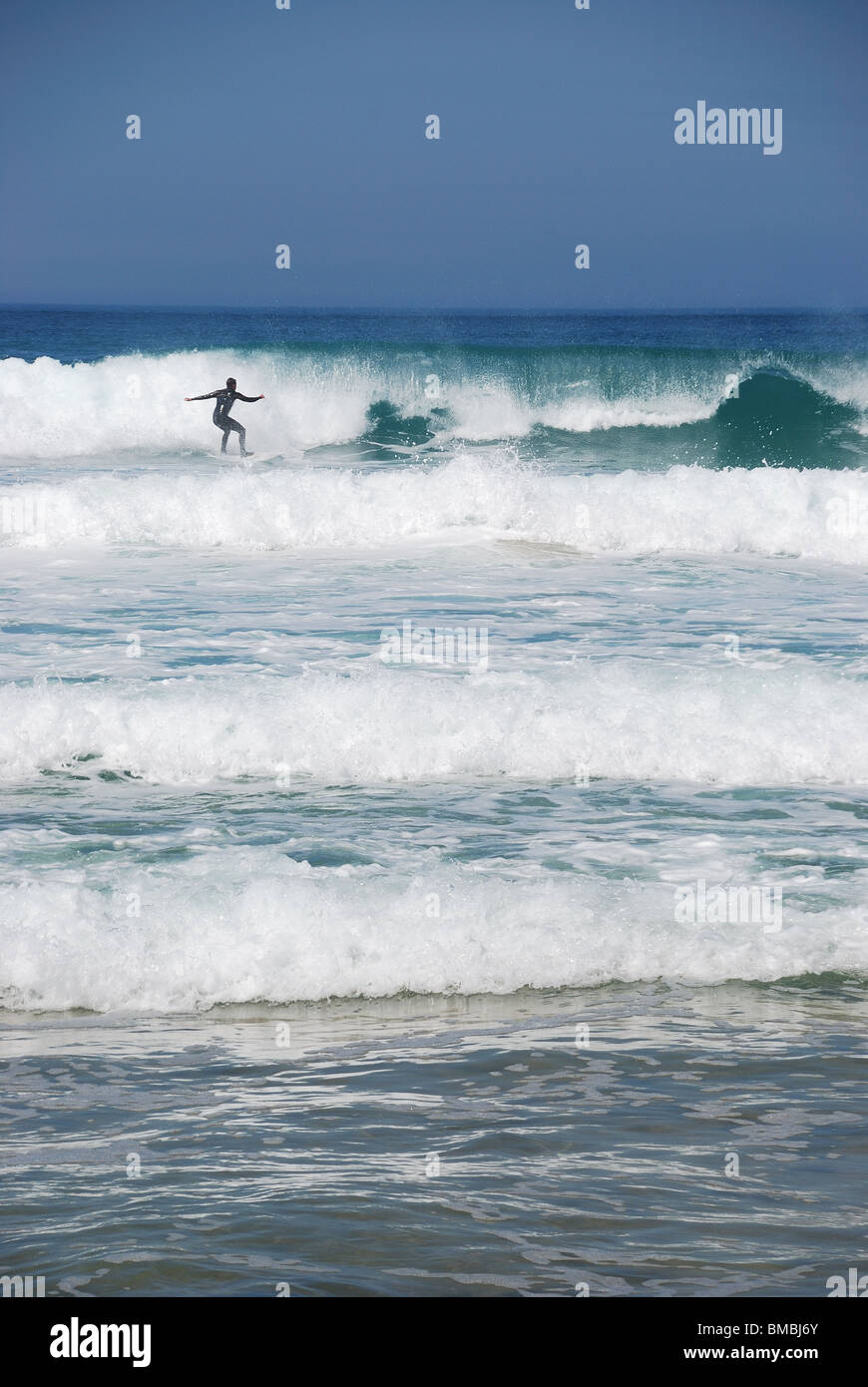 Surfer on board in Cornwall Stock Photo - Alamy