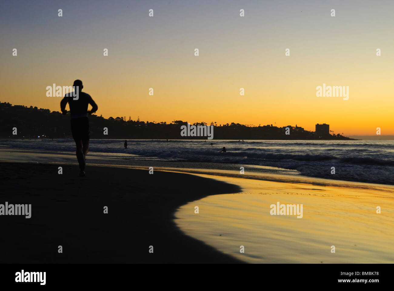 Runner in the beach hi-res stock photography and images - Alamy