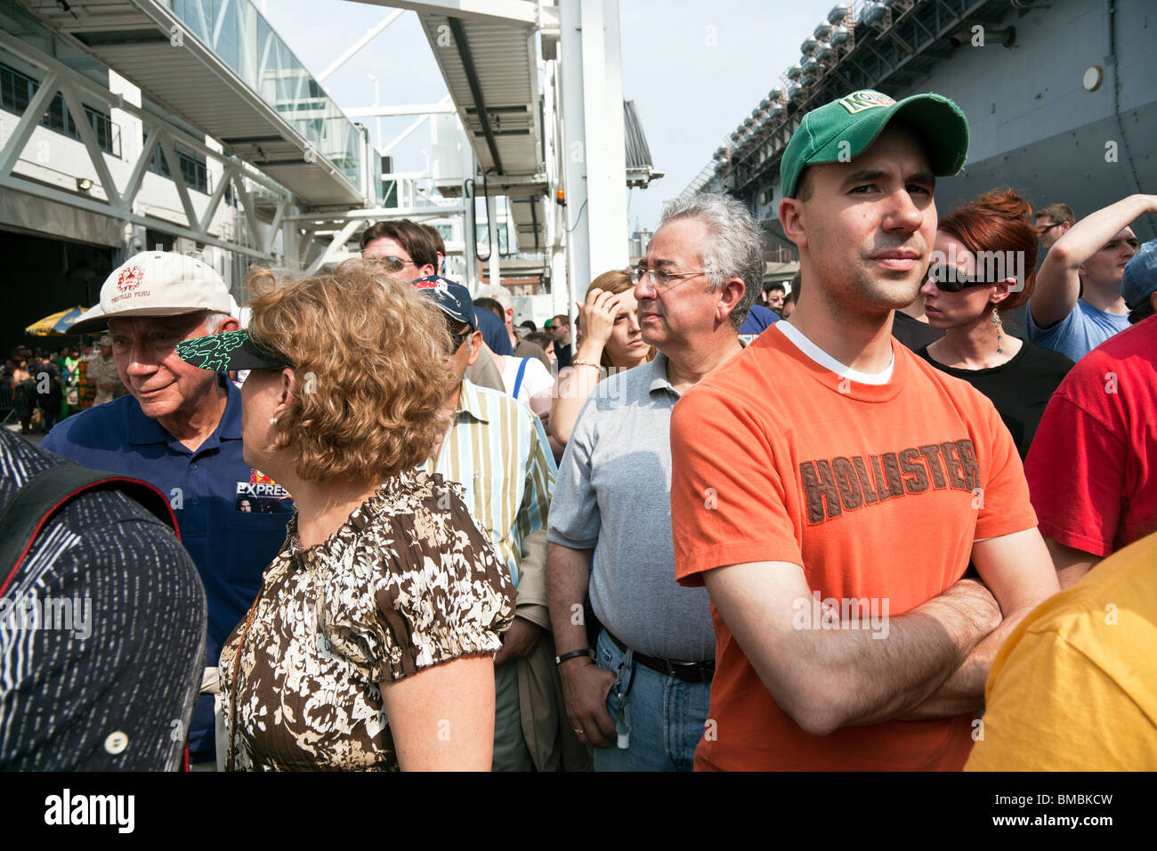 Diverse crowd patiently waiting hi-res stock photography and images - Alamy
