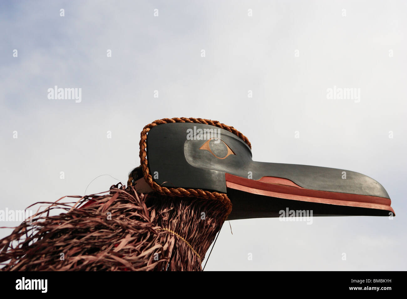 A Native American Alaskan Git-Hoan dancer in bird mask at the First ...