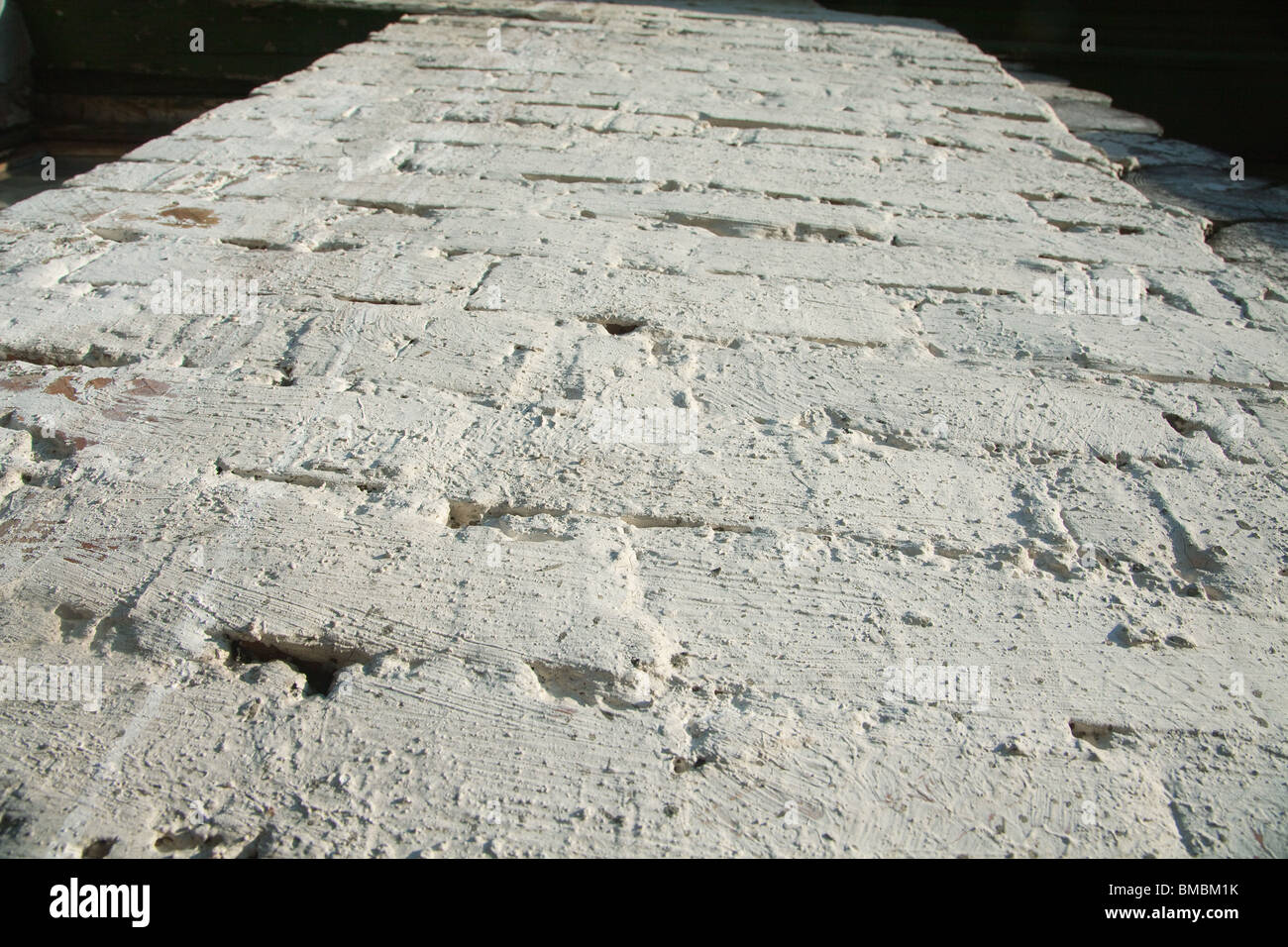 old white brick wall with traces of plaster Stock Photo - Alamy