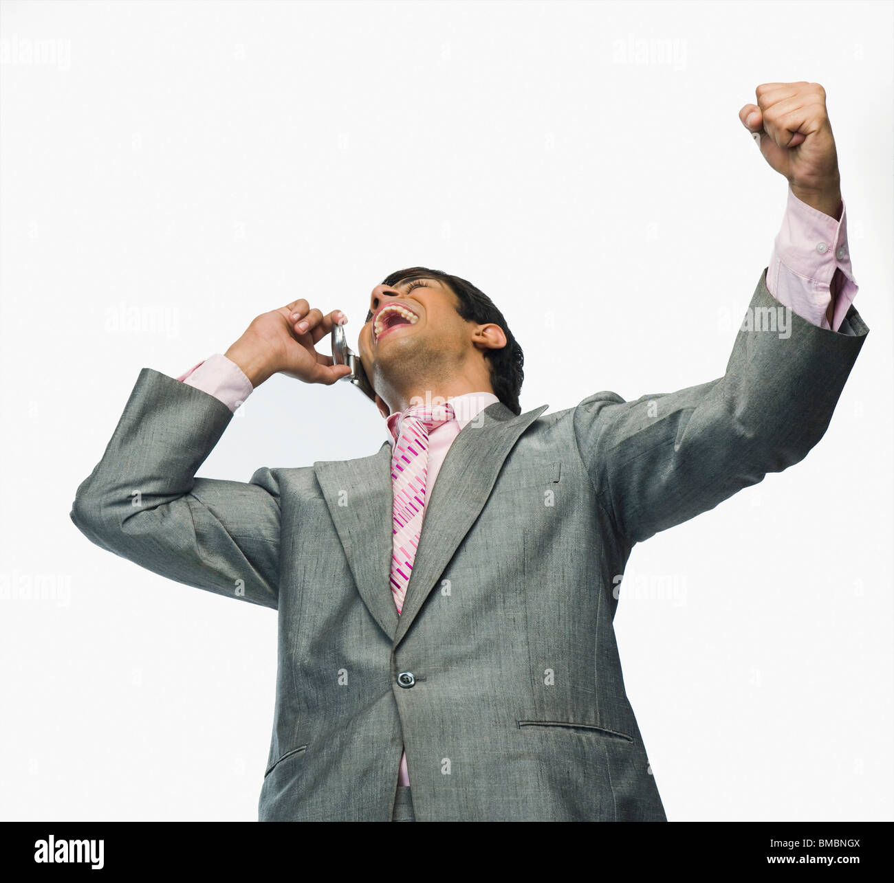Back view man raised fist hi-res stock photography and images - Alamy