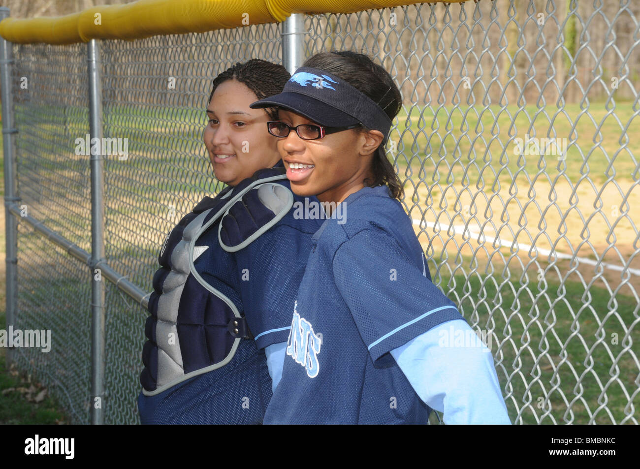 Teammates in softball Stock Photo - Alamy