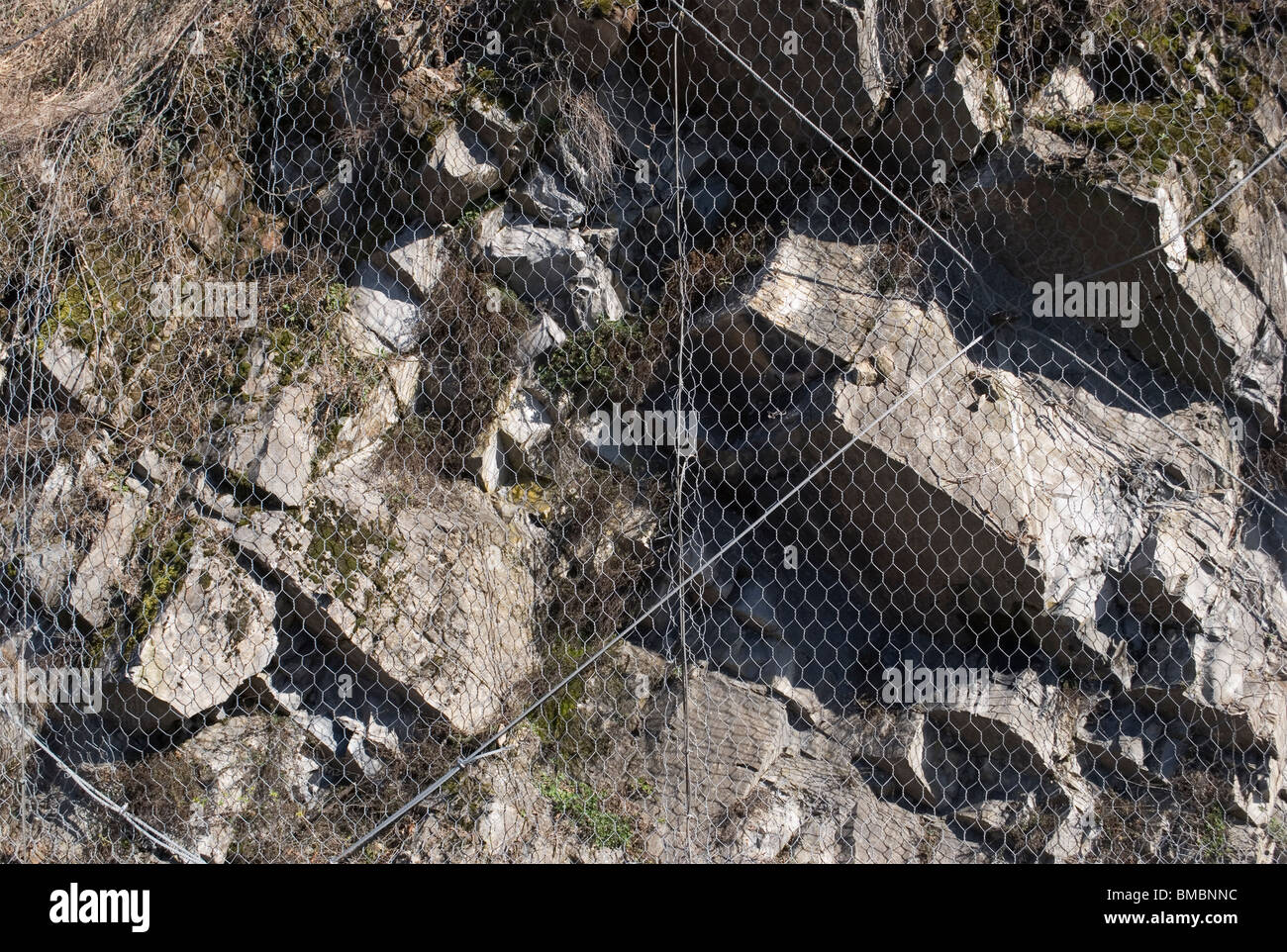 safety wire net to hold rocks Stock Photo - Alamy