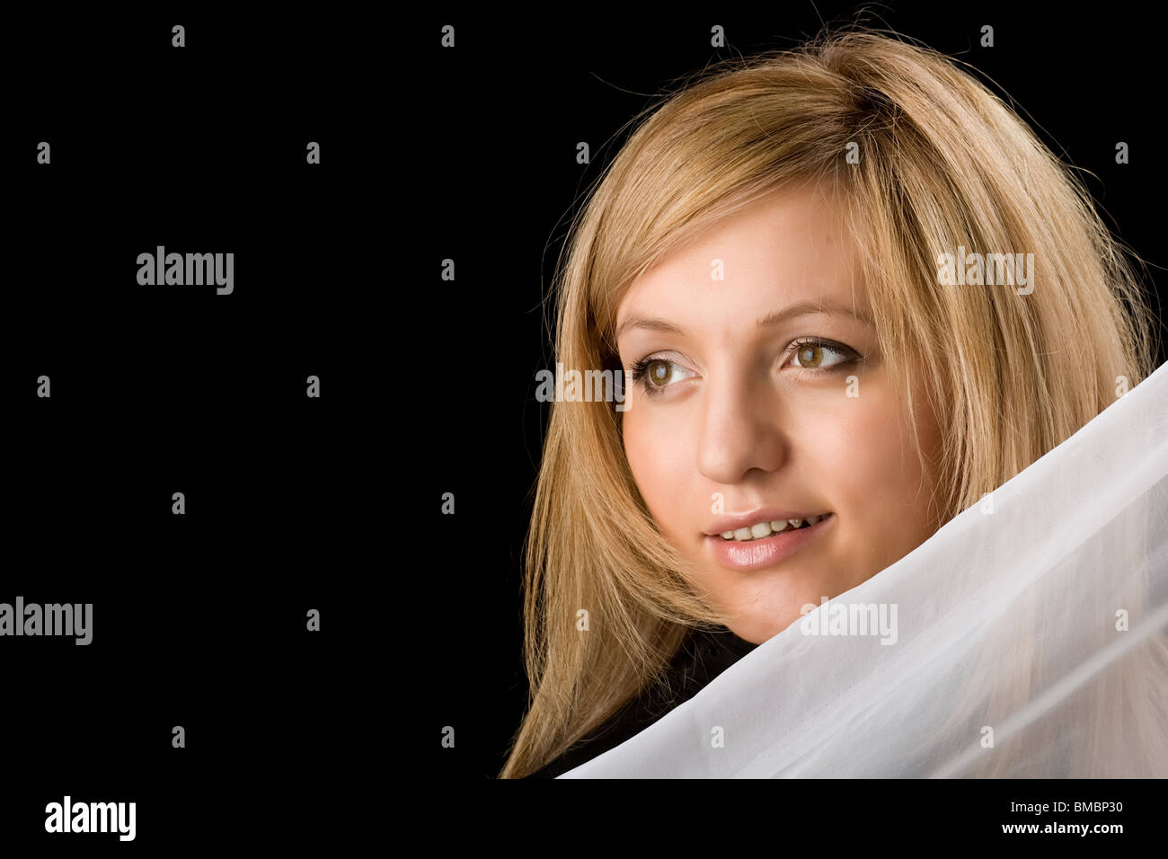 Beautiful Fair Haired Girl Pensively Looks Aside Isolated On Black