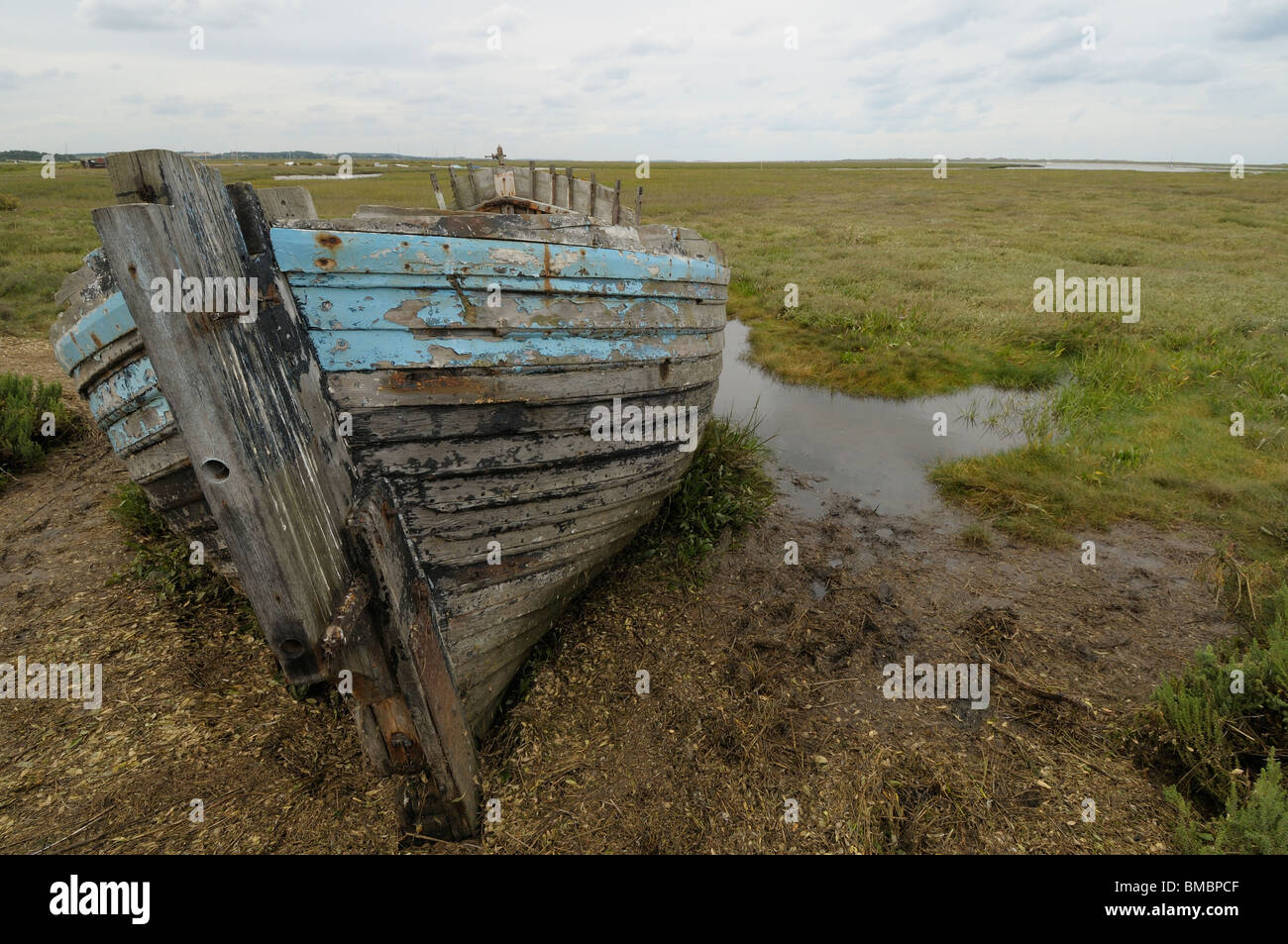 Old boat on marshes Stock Photo - Alamy