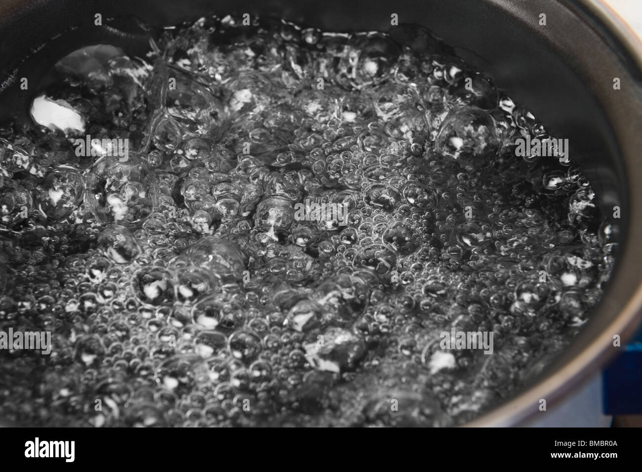 Boiling water in a pot Stock Photo - Alamy