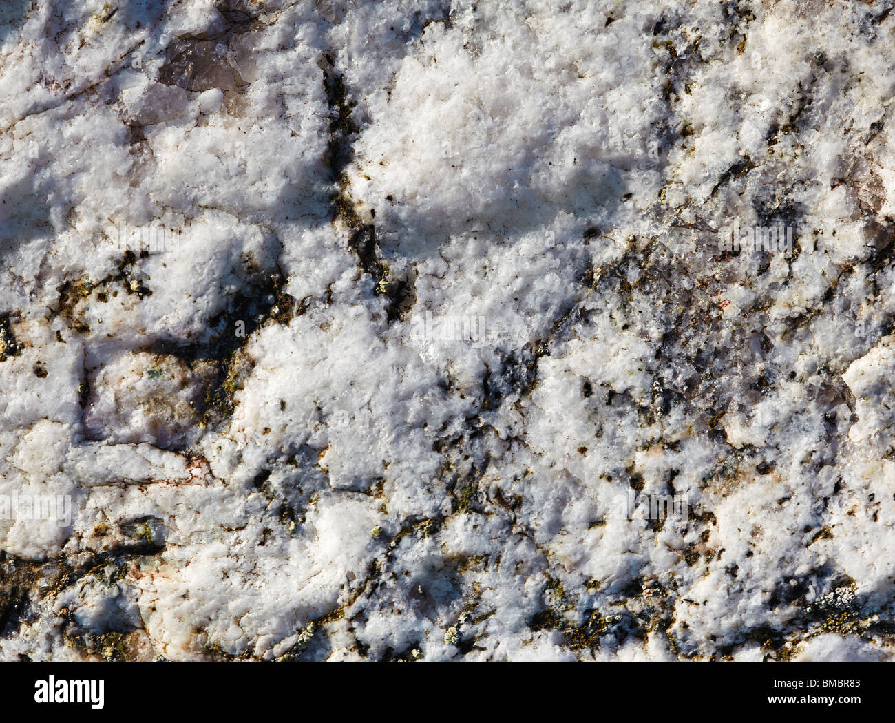 Surface of a rough rock from quartz and other minerals Stock Photo - Alamy