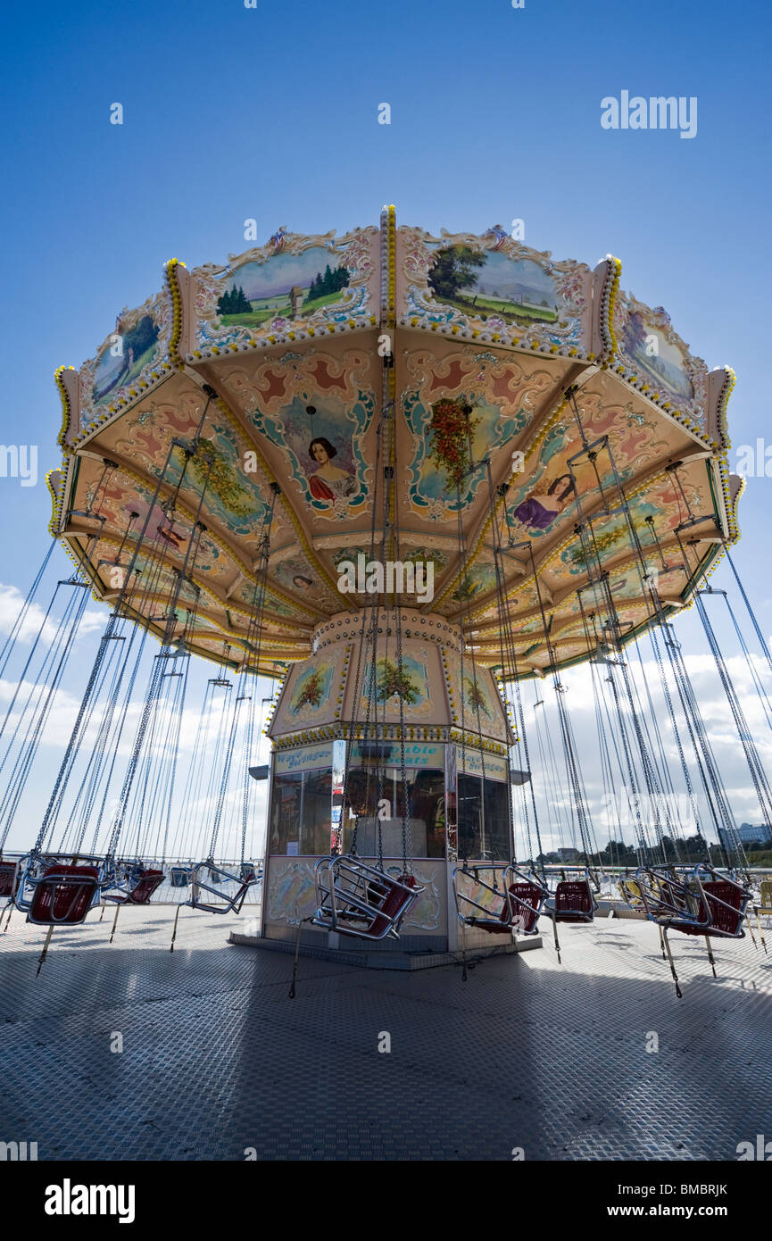 A traditional fairground amusement, fun and entertainment carousel ride ...