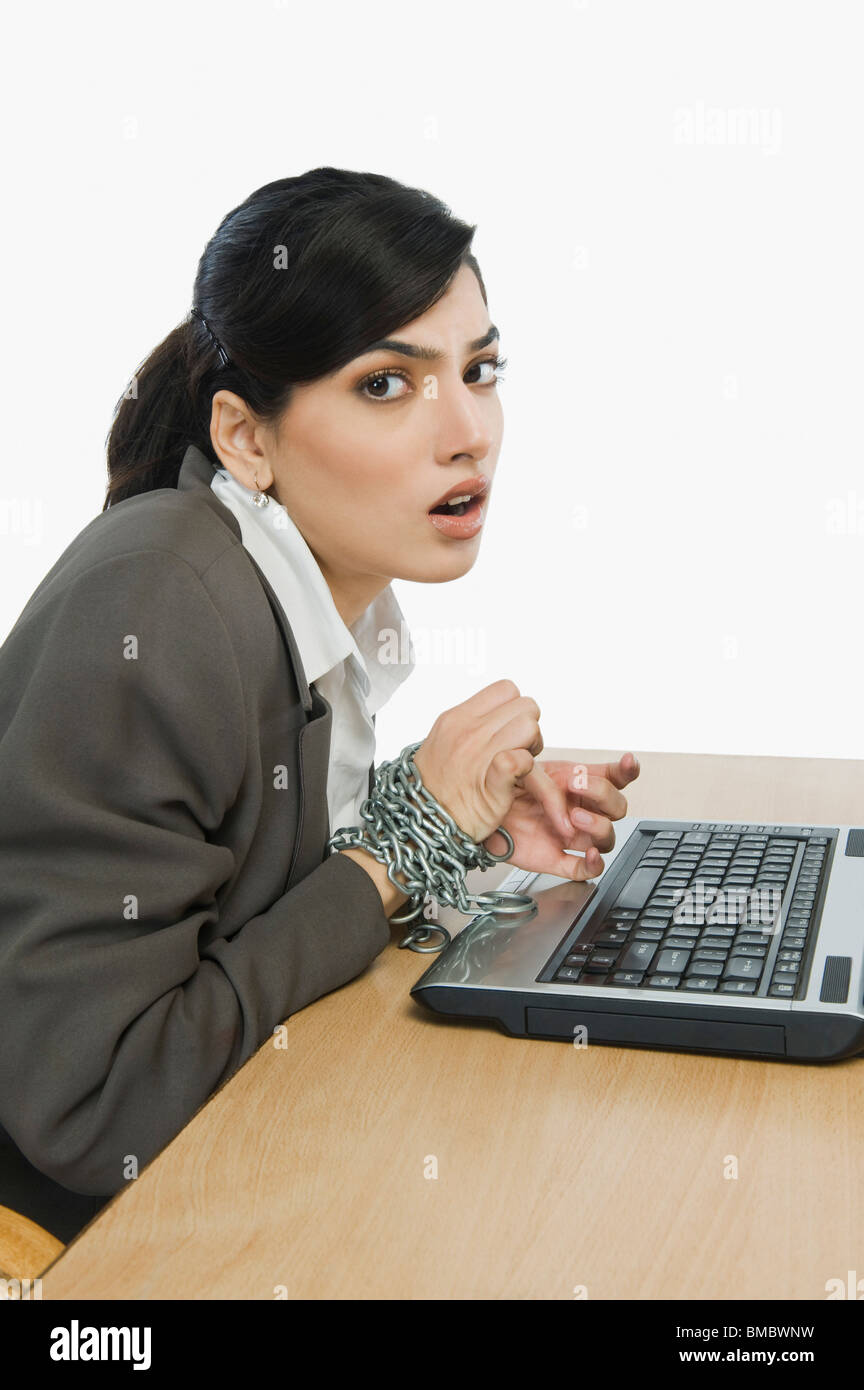 Chained to desk hi-res stock photography and images - Alamy