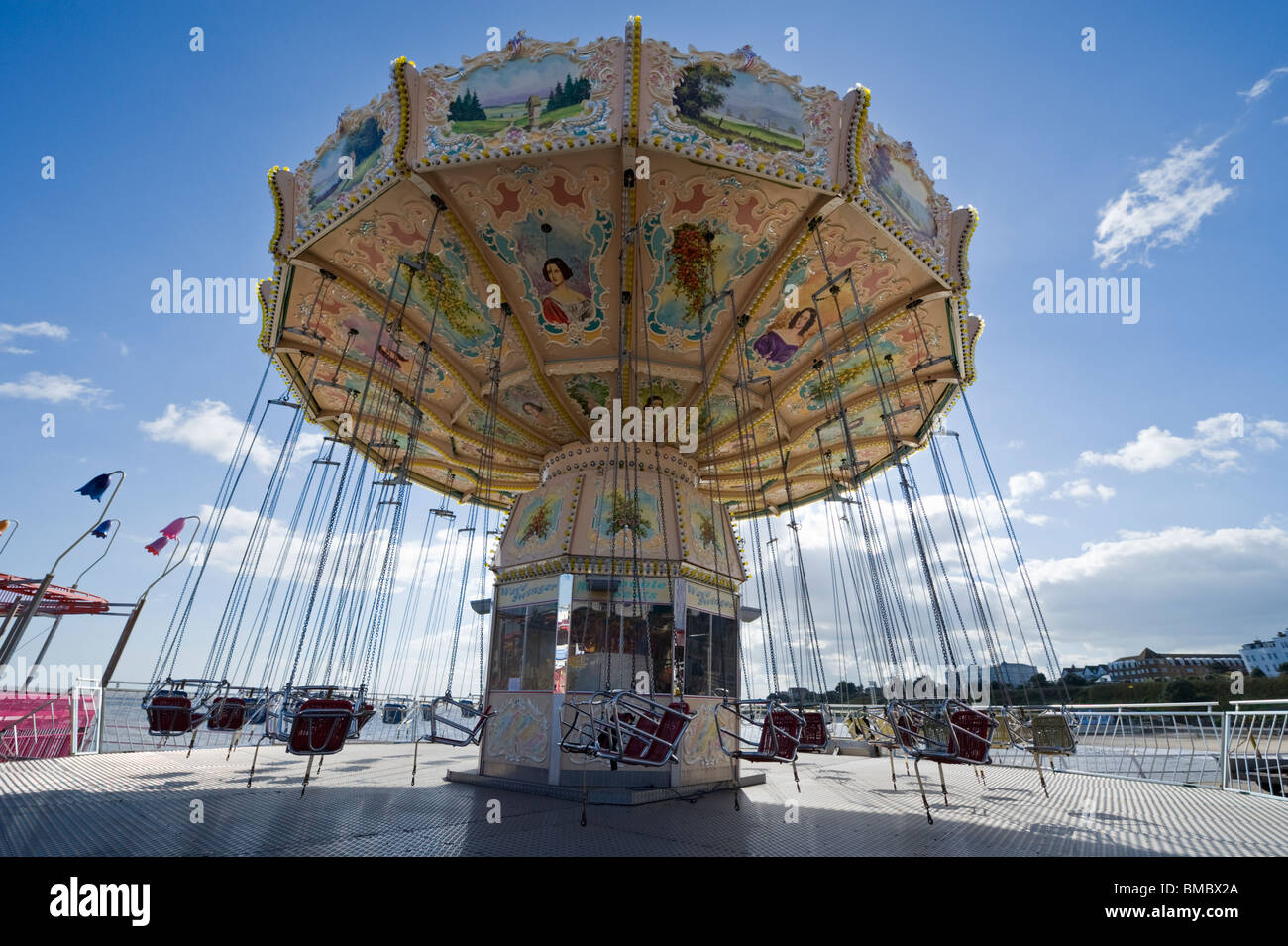 A traditional fairground amusement, fun and entertainment carousel ride ...