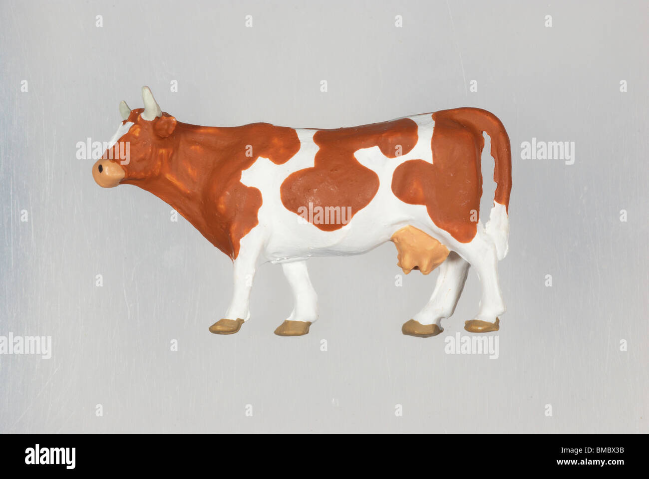 Plastic model cow Stock Photo - Alamy