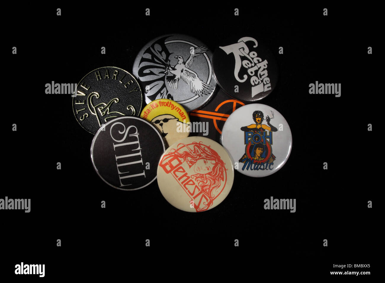 Selection of 1970`s music badges on a black background Stock Photo - Alamy