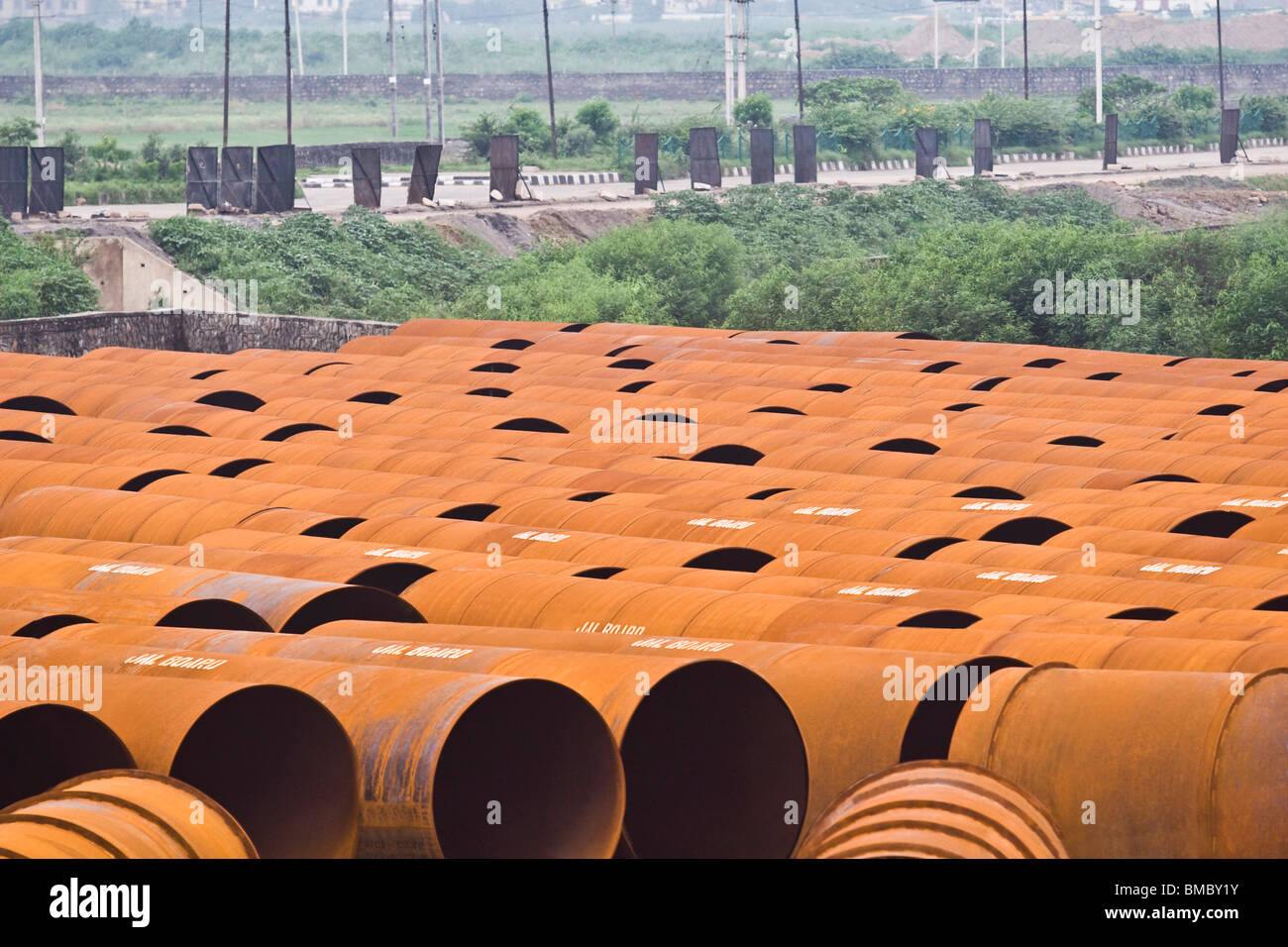 Rusty sewage pipes at the roadside, Delhi, India Stock Photo - Alamy