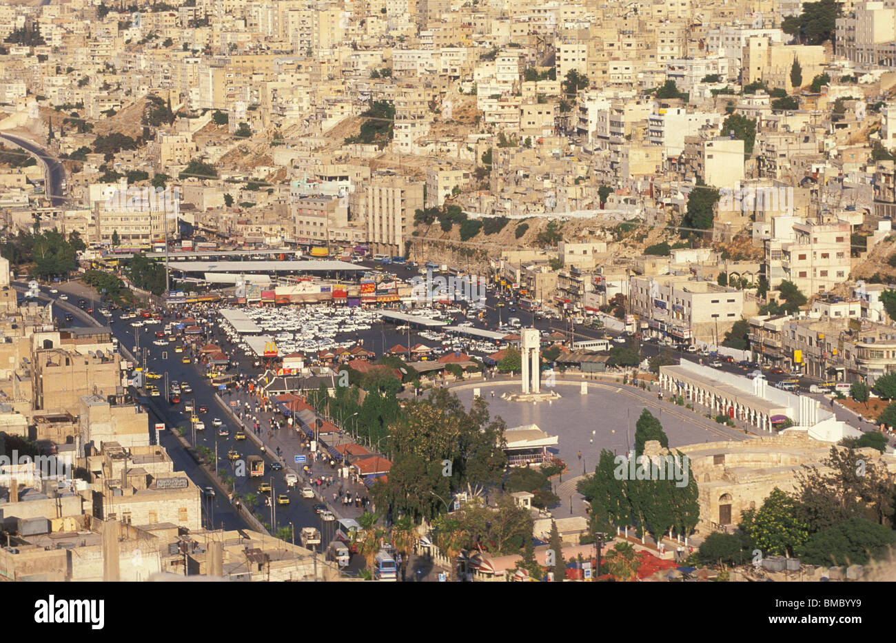 Busy traffic and the bus station in downtown Amman the capitol of ...