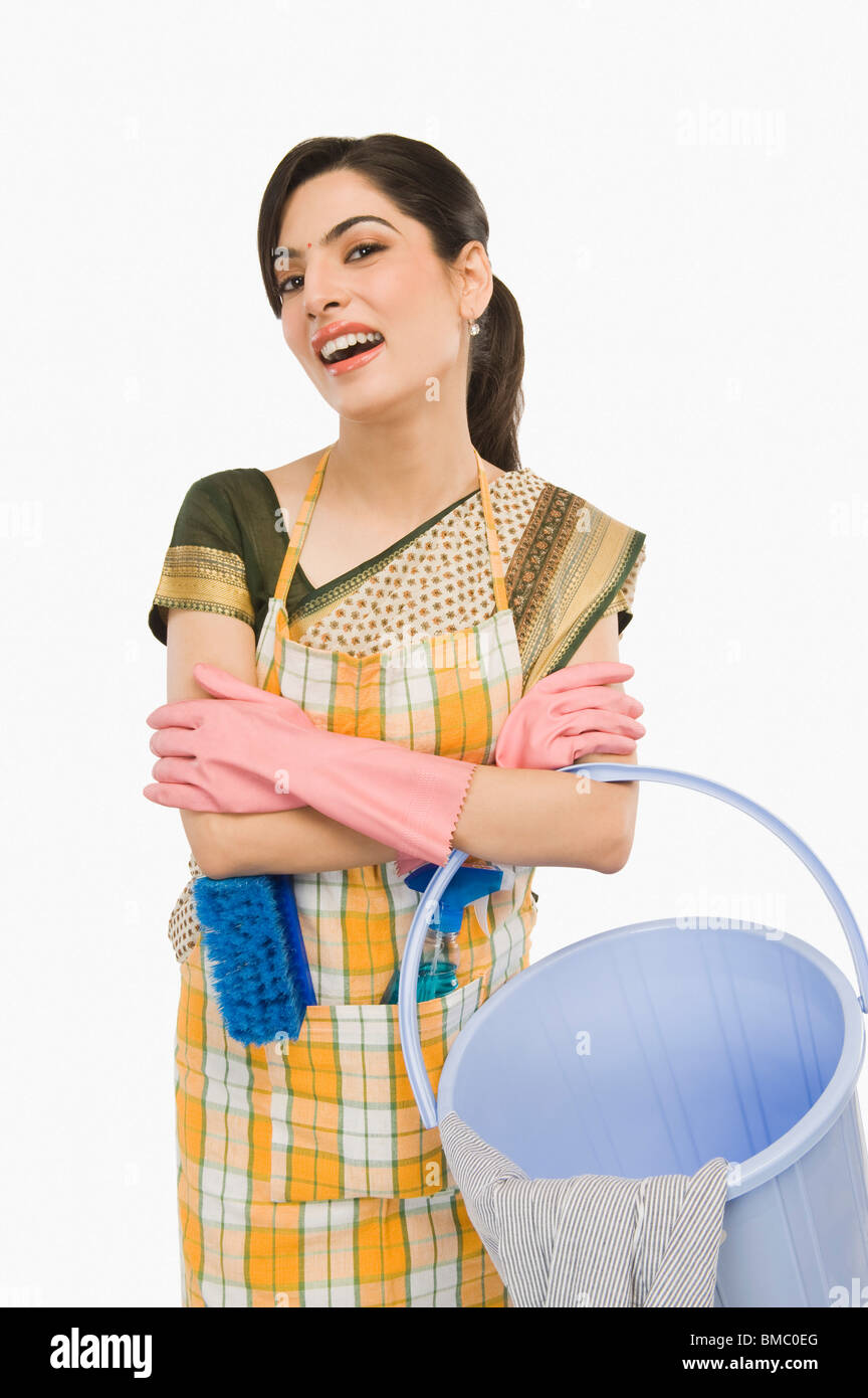 Woman bucket arms crossed hi-res stock photography and images - Alamy