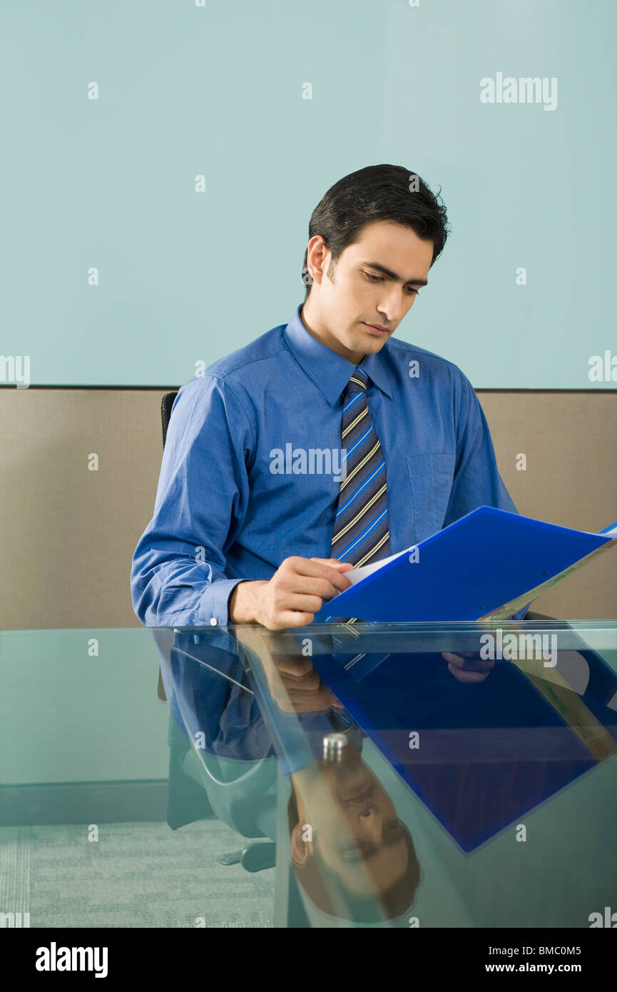 Indian man reading board hi-res stock photography and images - Alamy