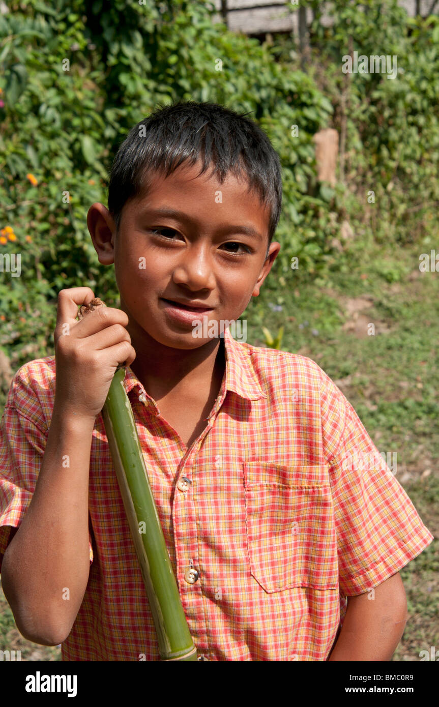 A Lao boy in Muang Ngoi village Northern Laos Stock Photo - Alamy